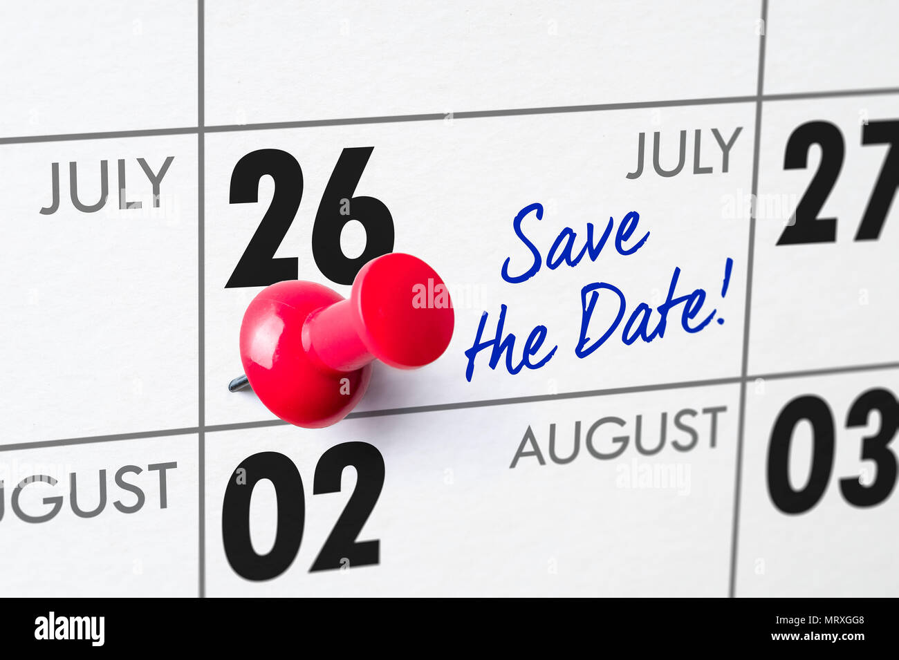 Wall calendar with a red pin - July 26 Stock Photo - Alamy