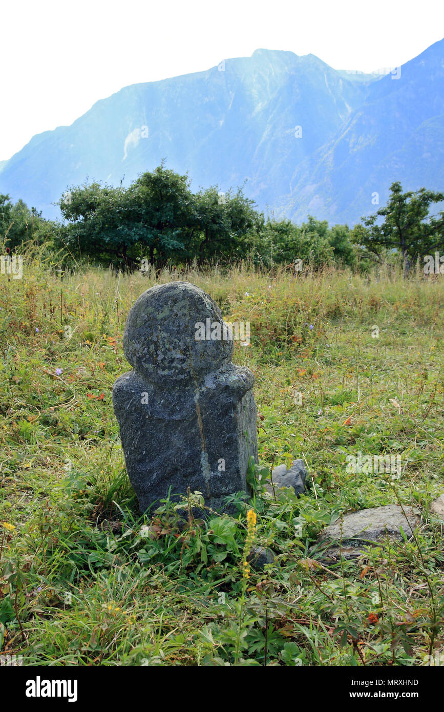 Stone statue of a warrior stone woman, balbal. Archaeological monument ...