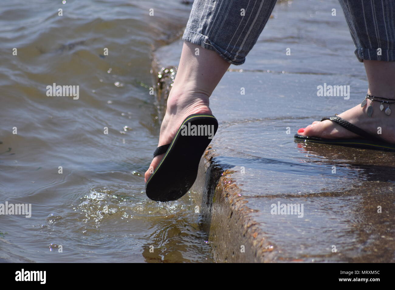 Dipping toe into water hi-res stock photography and images - Alamy