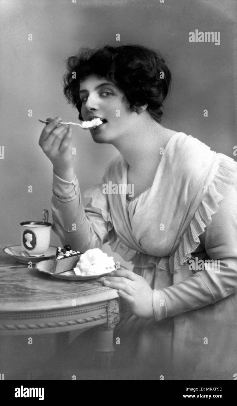 Retro eating cake hi-res stock photography and images - Alamy