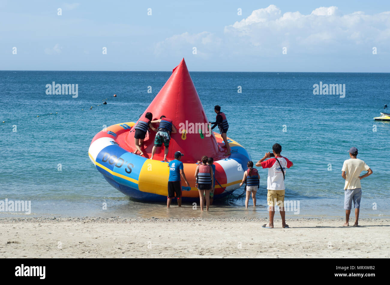 An inflatable, White Beach, Mindoro Stock Photo - Alamy