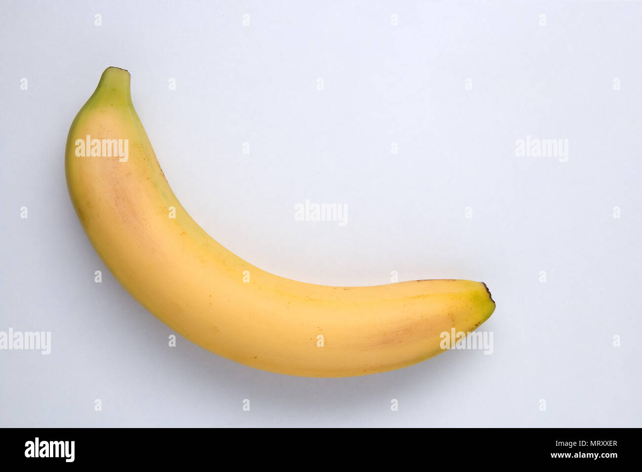 Natural looking banana on white background. Fruit Stock Photo - Alamy