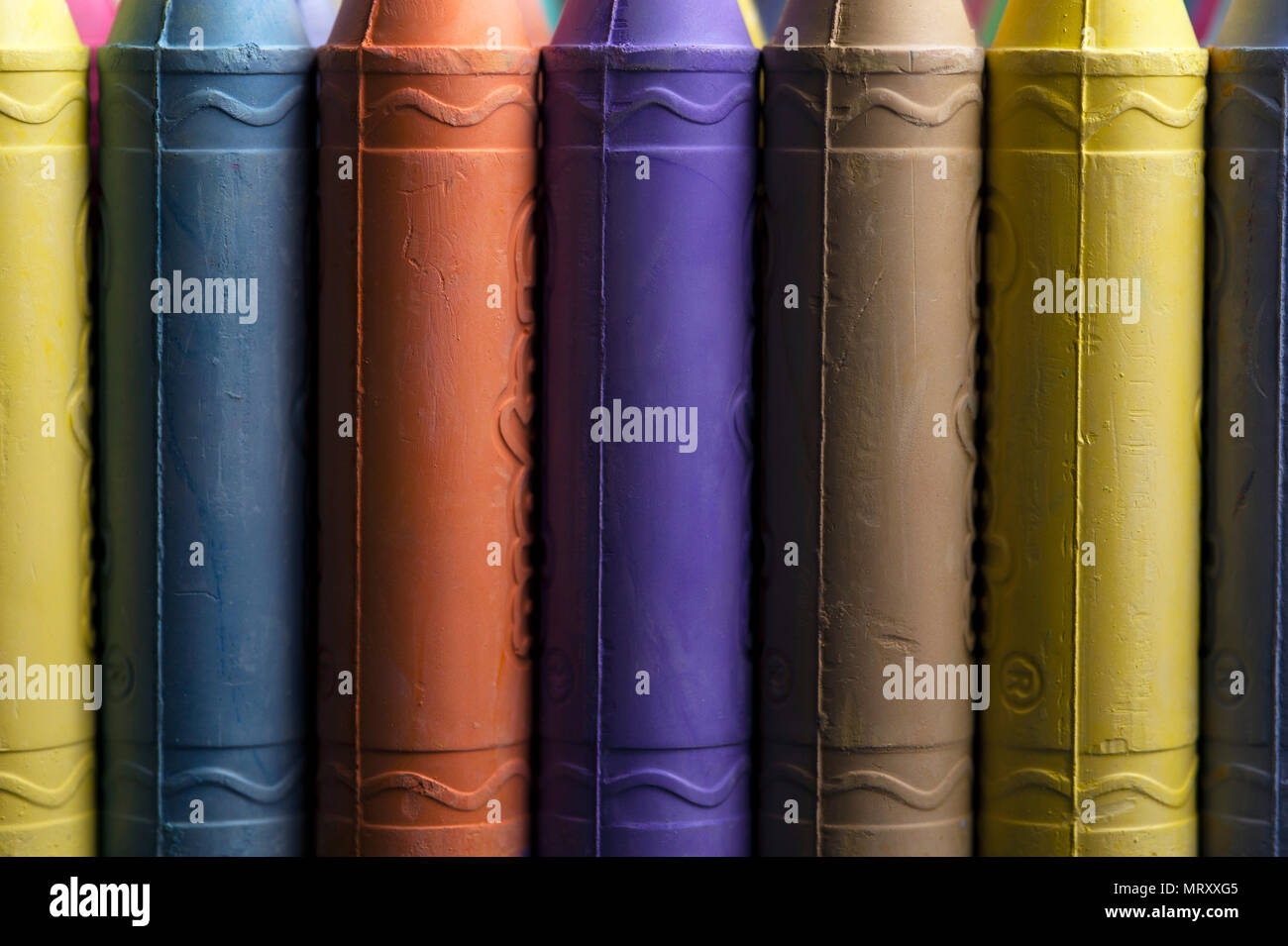 Multicolored colored chalk in rows creating interesting color patterns ...