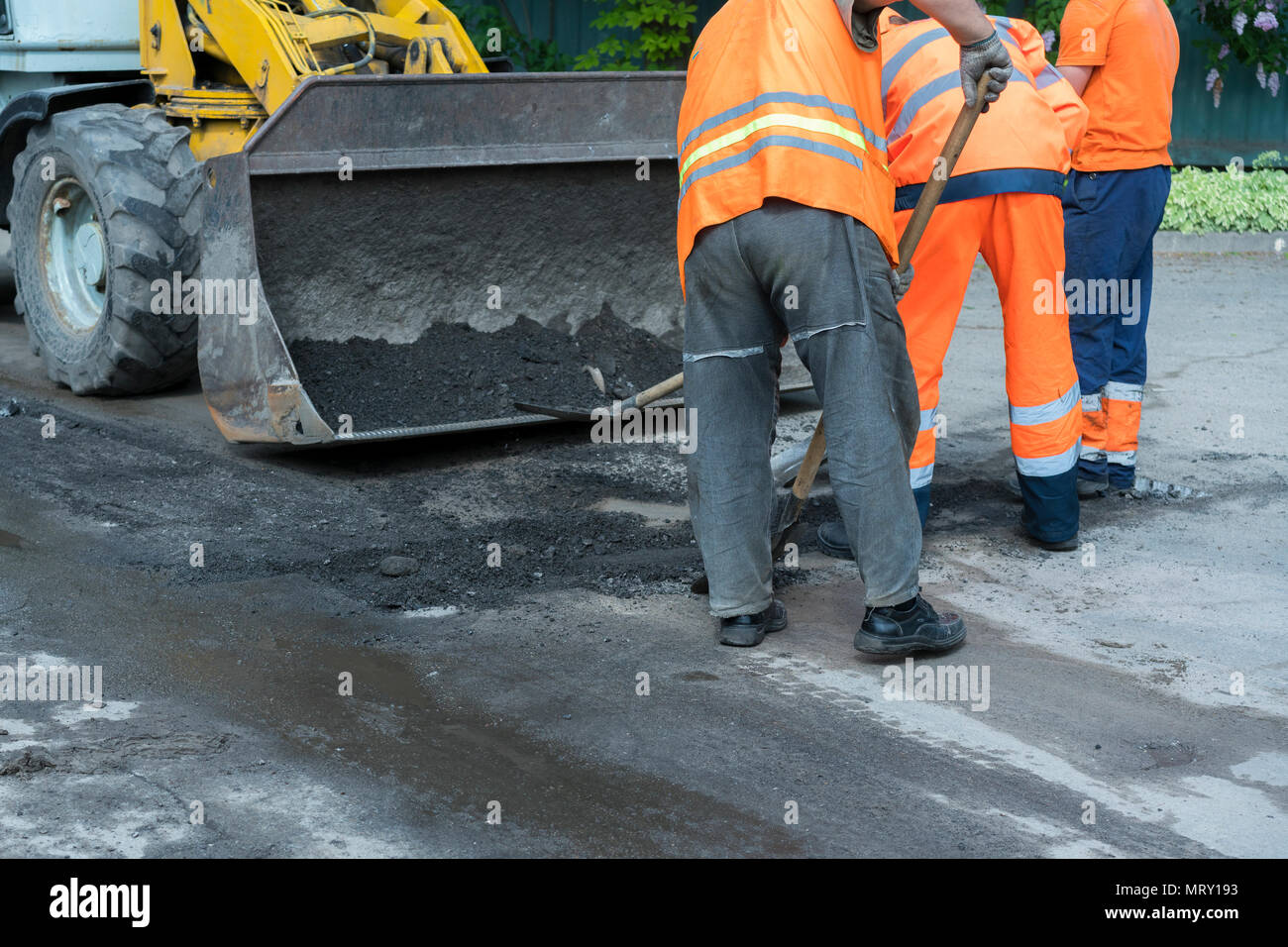 Workers on a road construction, industry and teamwork. builders workers ...