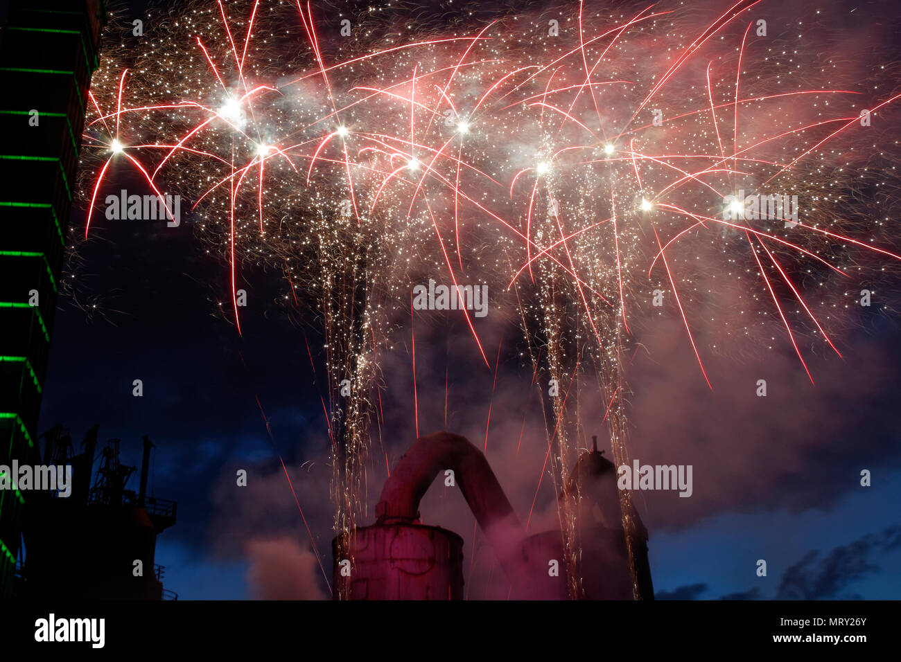 fireworks behind a blast furnace and stell mill Stock Photo - Alamy