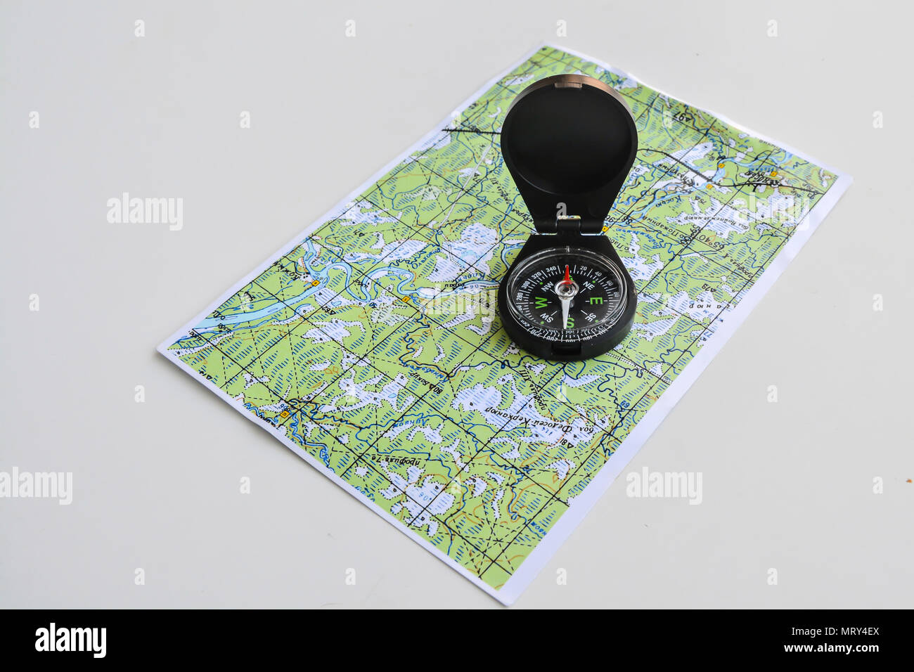 Compass and topographic map. Accessories travel so as not to get lost ...