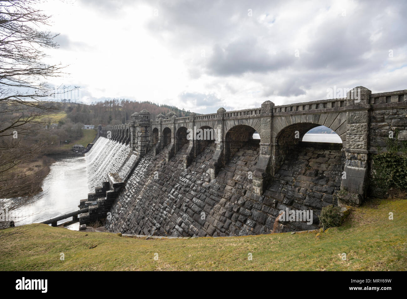 Water flowing over the crest of the dam in Lake Vyrnwy, reservoir in ...