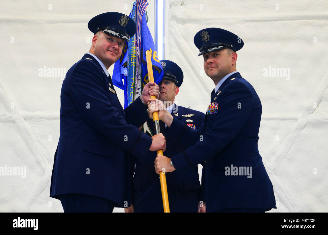 Col. Richard Carrel, 59th Operations Group commander, passes the 36th ...