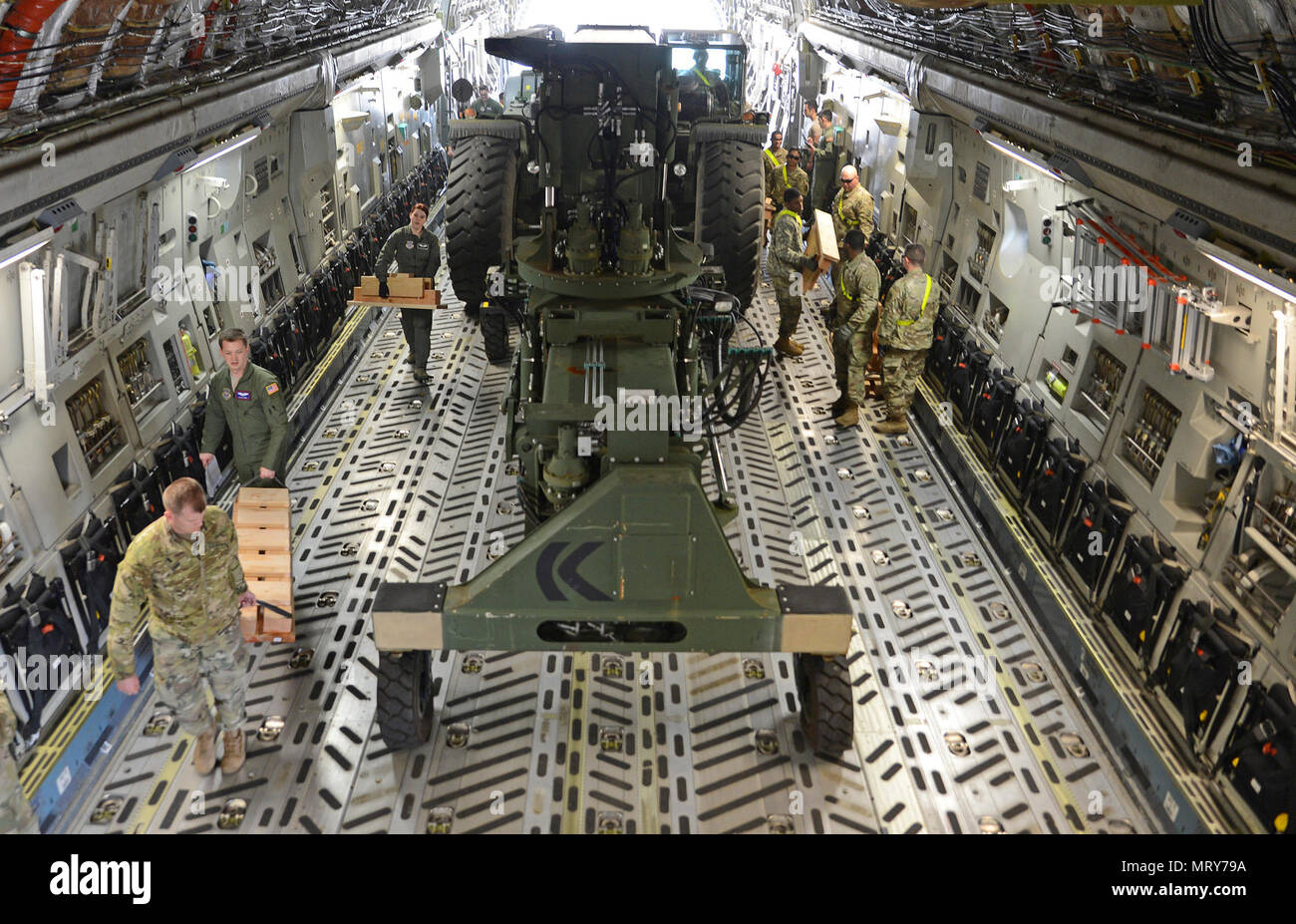 Soldiers from the 593rd Special Troops Battalion work with Airmenn from ...