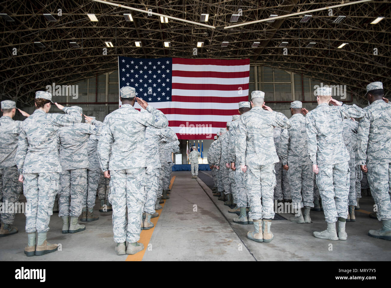 U.S. Airmen from the 18th Wing render their first salute to Brig. Gen ...