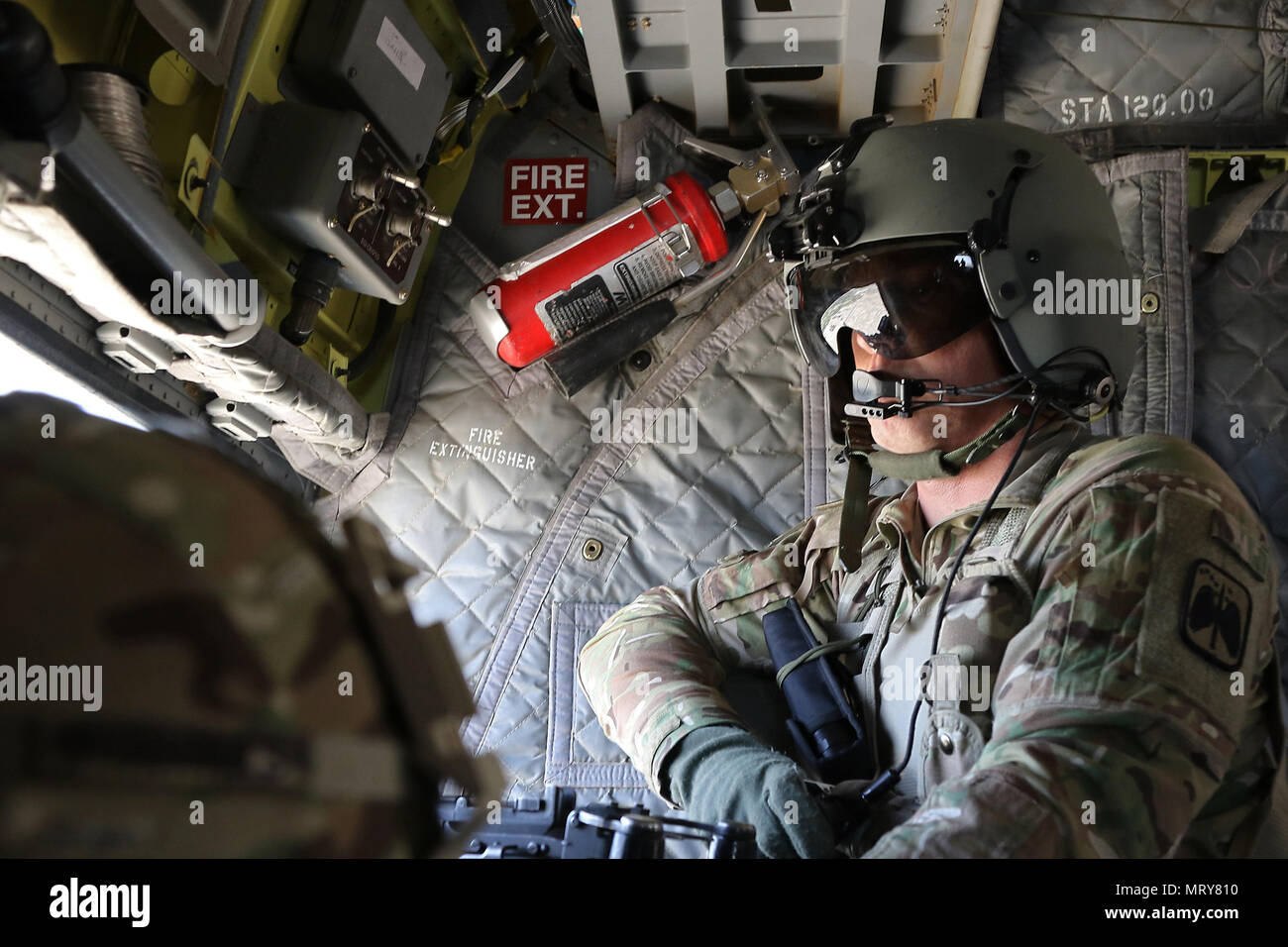 U.S. Army CH-47 Chinook helicopter crew chiefs assigned to Task Force ...
