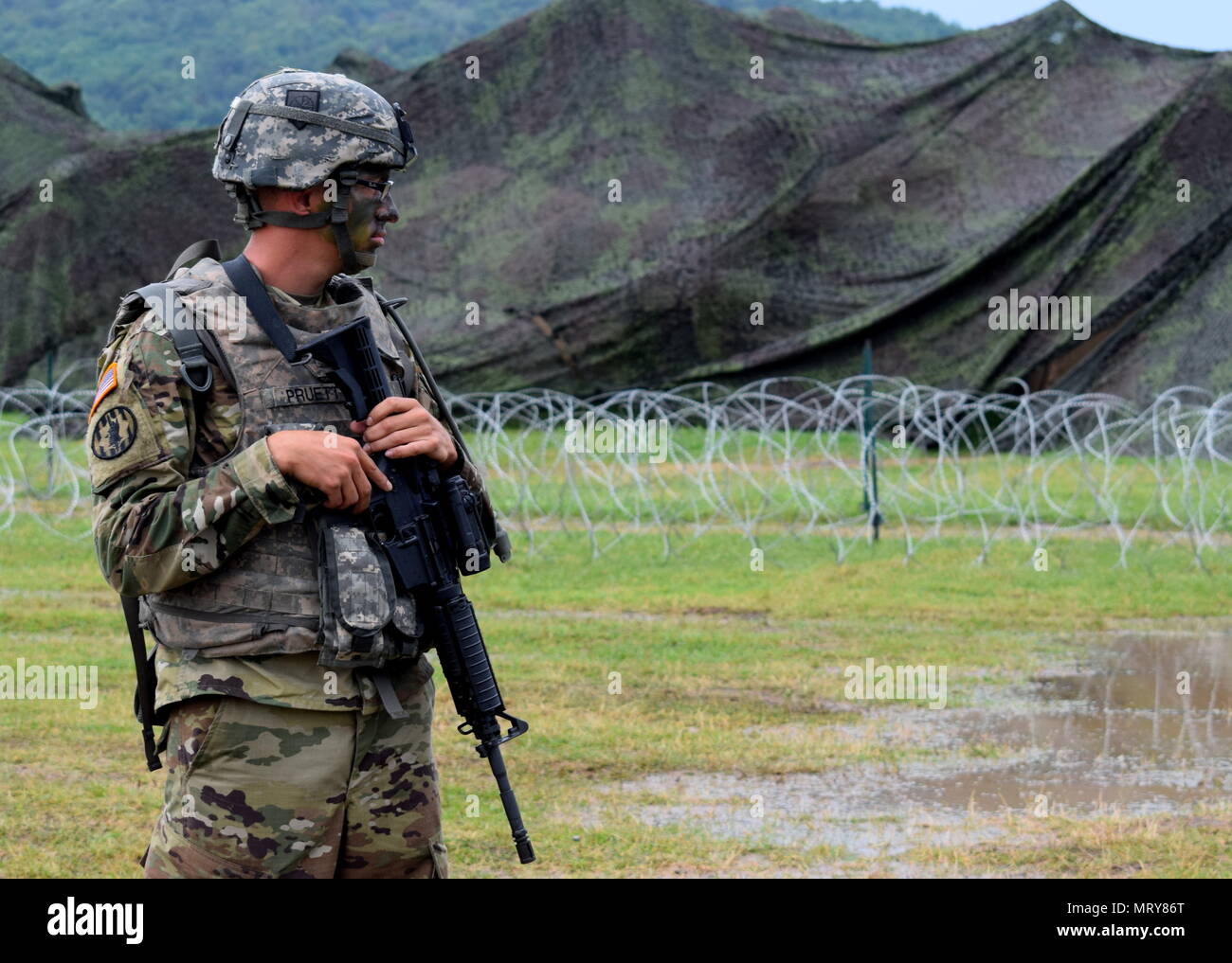 Georgia Army National Guard Spc. Joshua Pruett provides security for ...