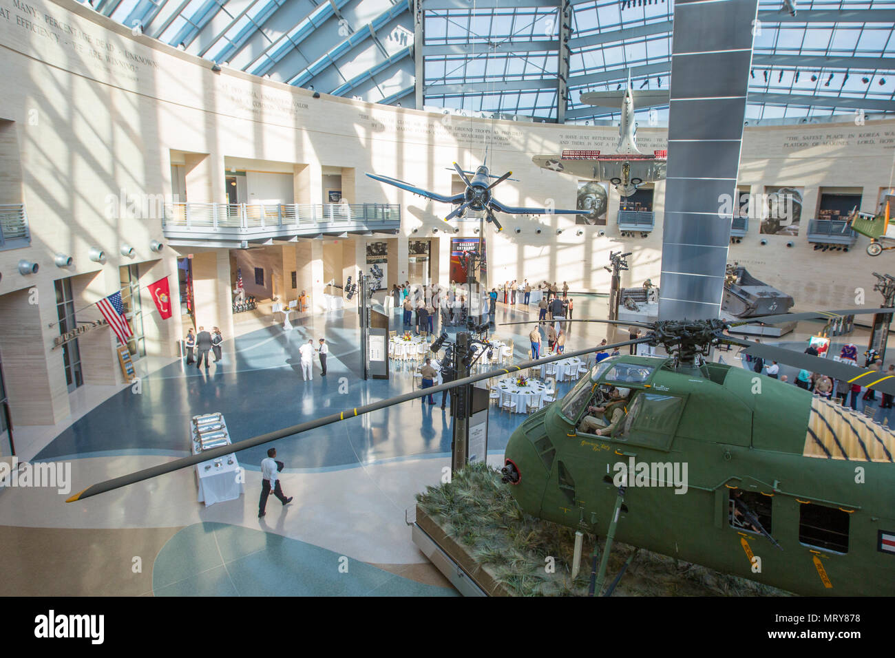 U.S. Marines and civilians attend the U.S. Marine Corps Sports Hall of ...