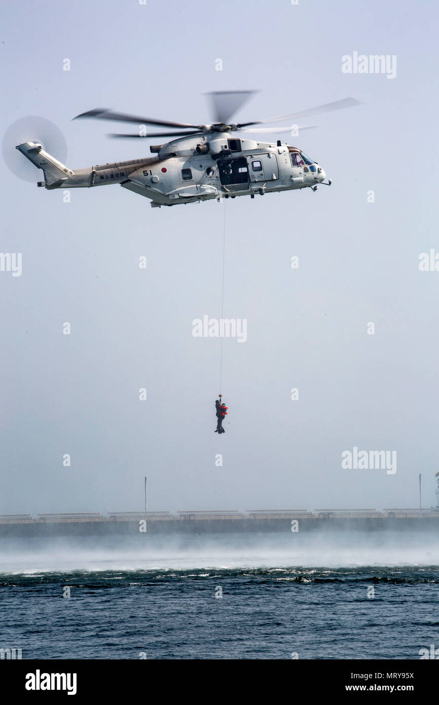 Japan Martime Self-Defense Force (JMSDF) personnel conduct water ...