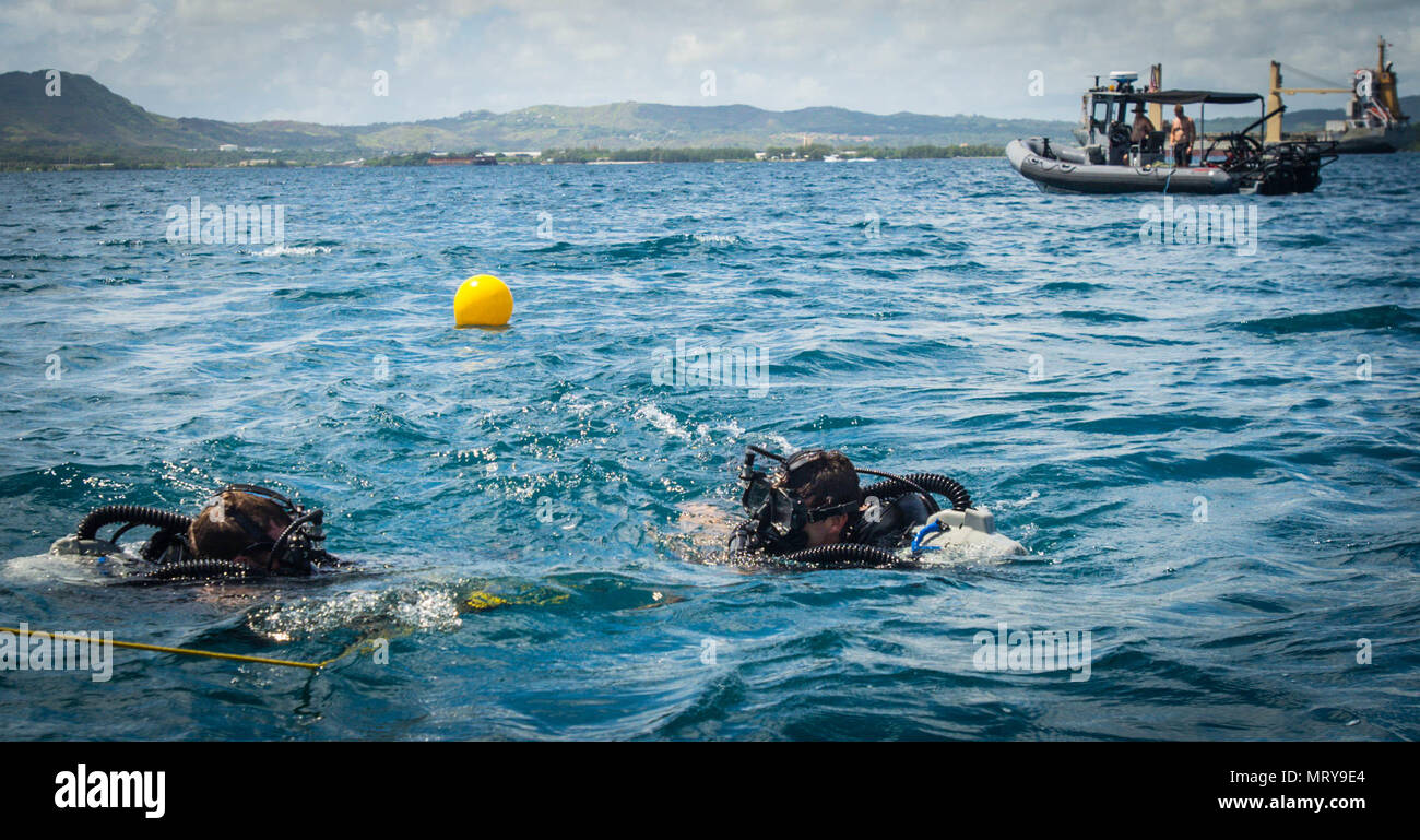 Two EOD technicians from EODMU 5 Platoon 502 conduct mine ...