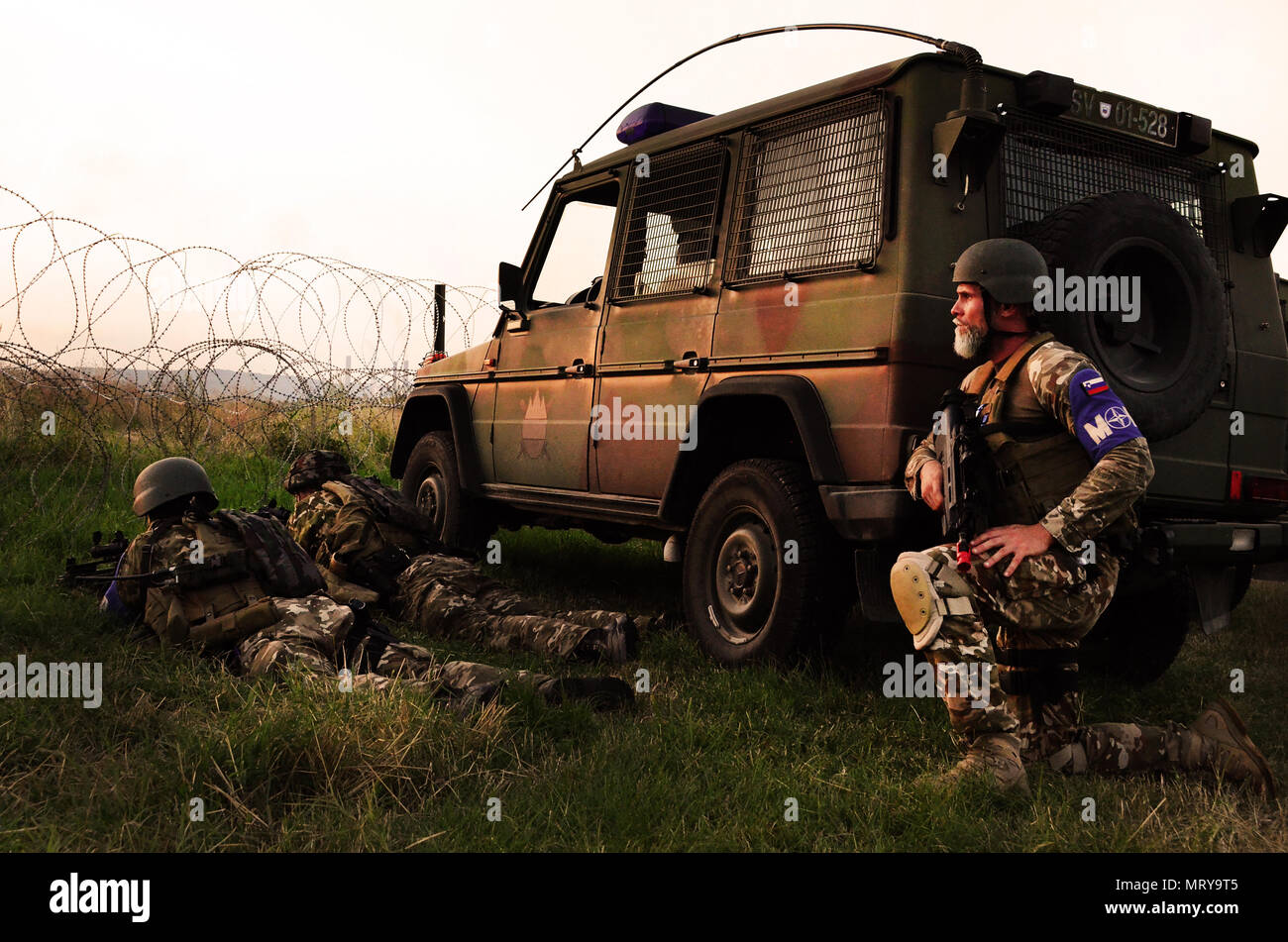 Members of the Slovenian Armed Forces conduct security training in ...