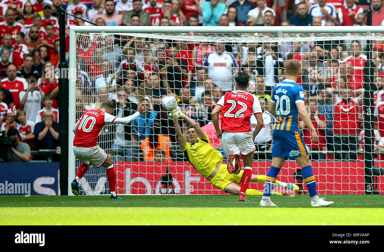 Rotherham United's David Ball (left) has a penalty saved by Shrewsbury ...
