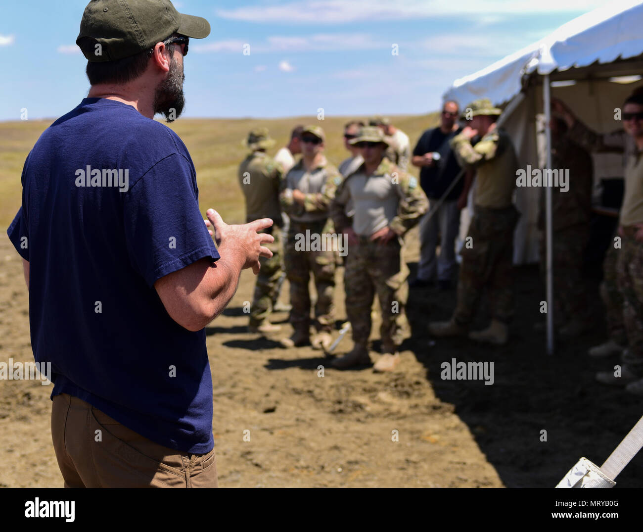 An FBI Special Agent Bomb Technician instructs a group of 28th Civil ...