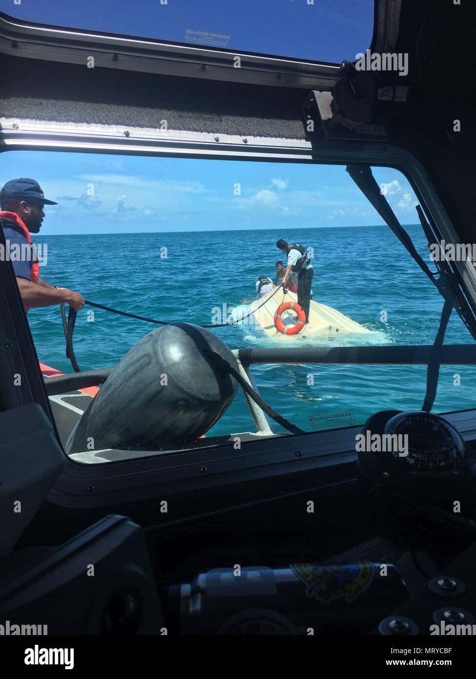 A Coast Guard Station Islamorada boat crew rescued five boaters July 15 ...