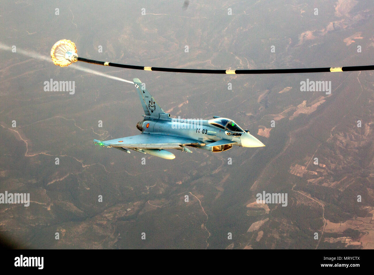 A Spanish Air Force Eurofighter Typhoon trails a U.S Marine KC-130J ...