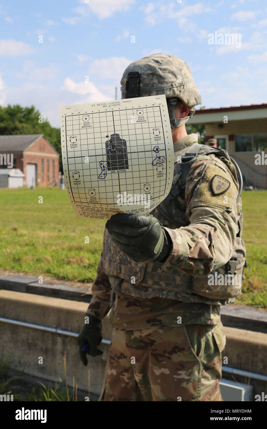 U.S. Army Sgt. Andrew Roland, 71st Ordnance Group (EOD), shows off his ...