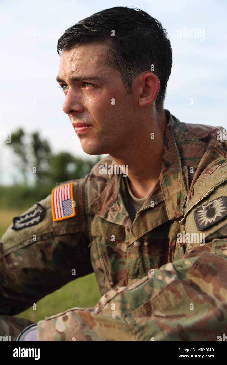 U.S. Army Cpl. Mark Combs, 52nd Ordnance Group (EOD), recovers after a ...