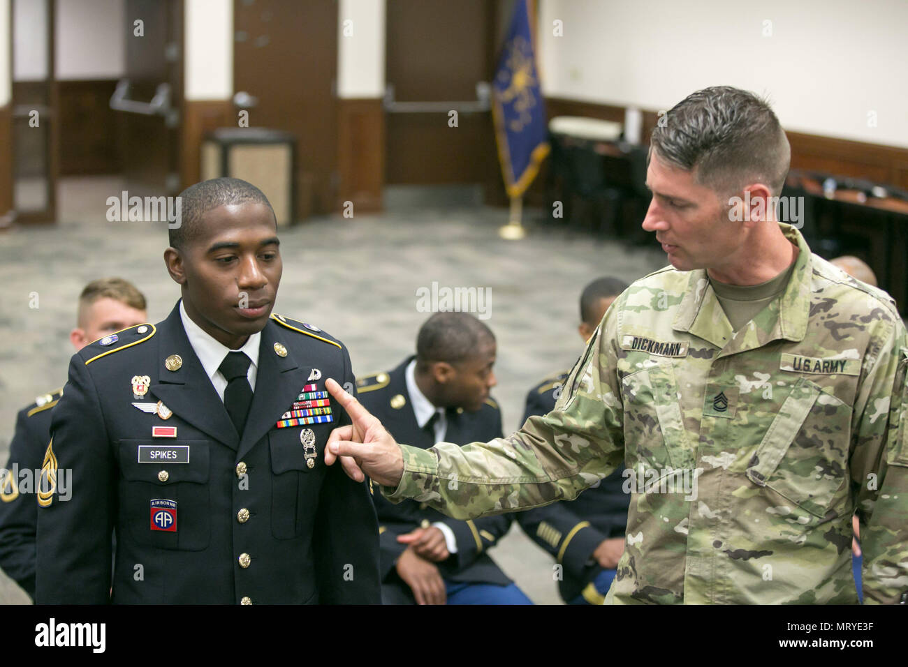 U.S. Army Sgt. 1st Class David Dickmann, right, inspects Sgt. 1st Class ...