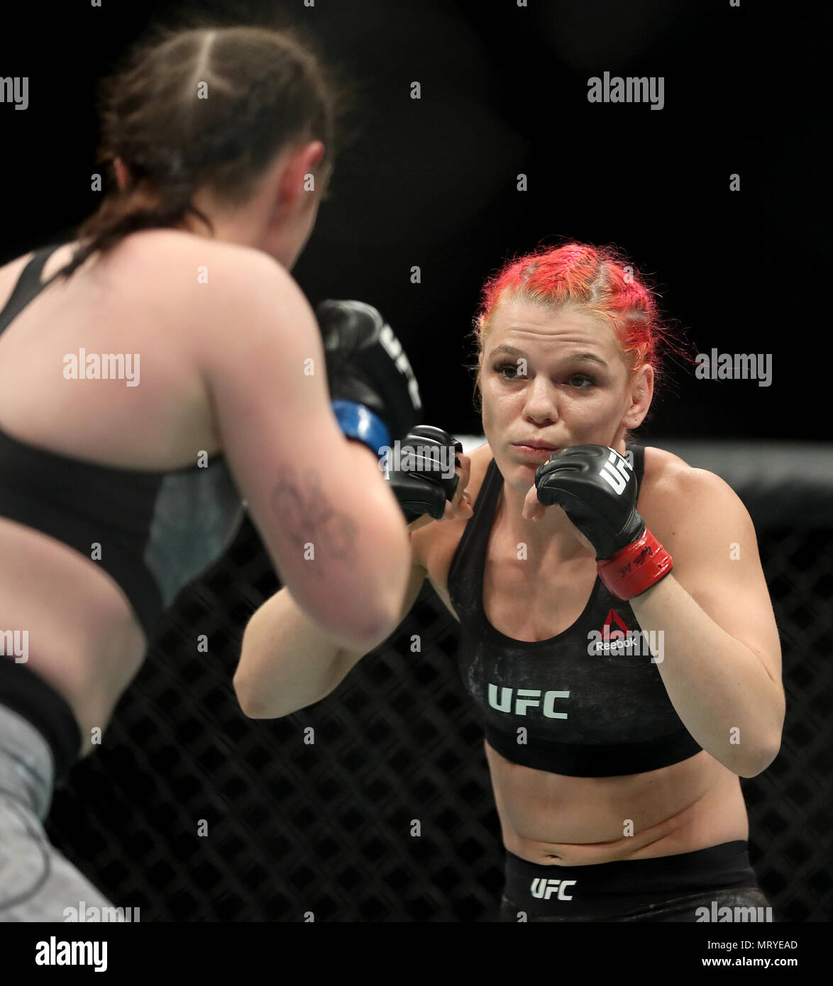 Gillian Robertson (right) in action against Molly McCann during UFC ...