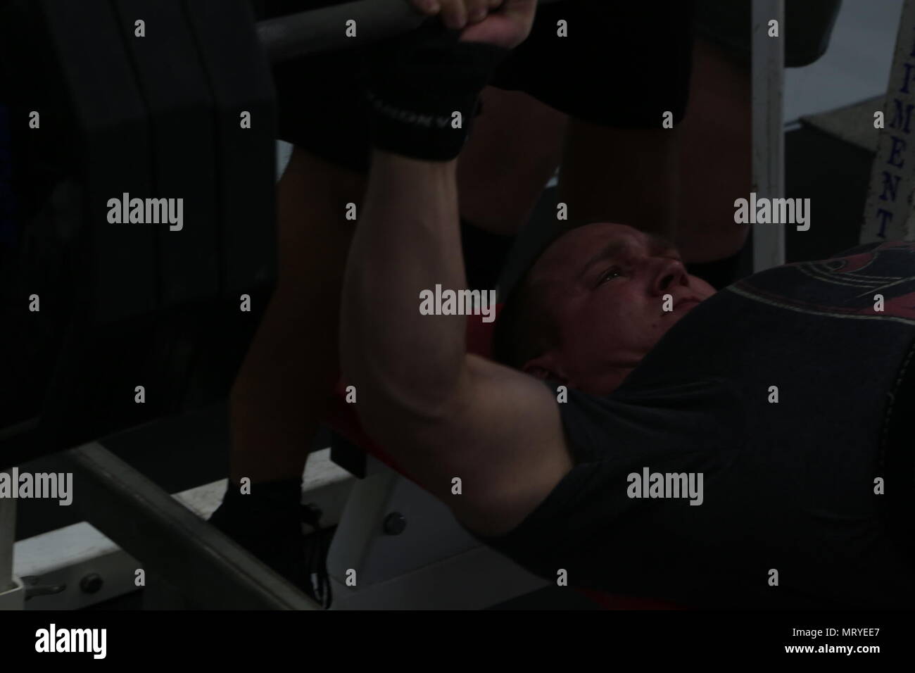 CAMP FOSTER, OKINAWA, Japan –Cpl. Trevor White battles to press the ...