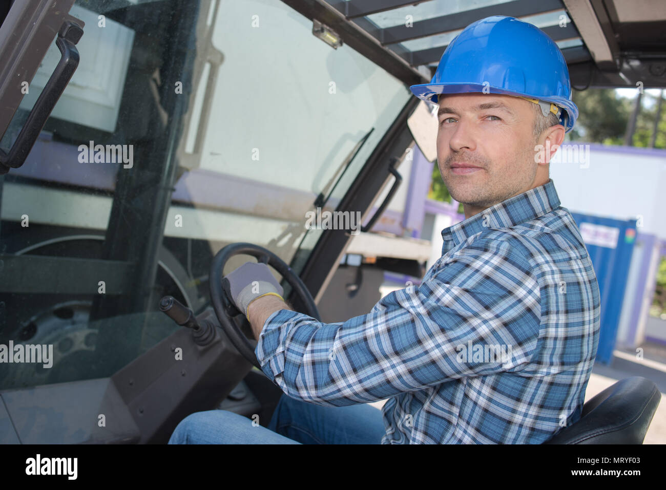 Portrait of forklift driver Stock Photo - Alamy