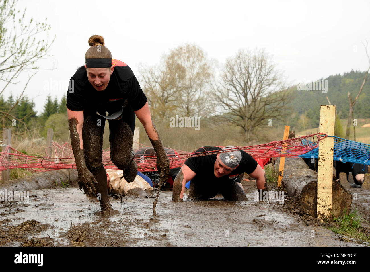 Runners participate in the annual Rugged Terrain Obstacle Run at ...