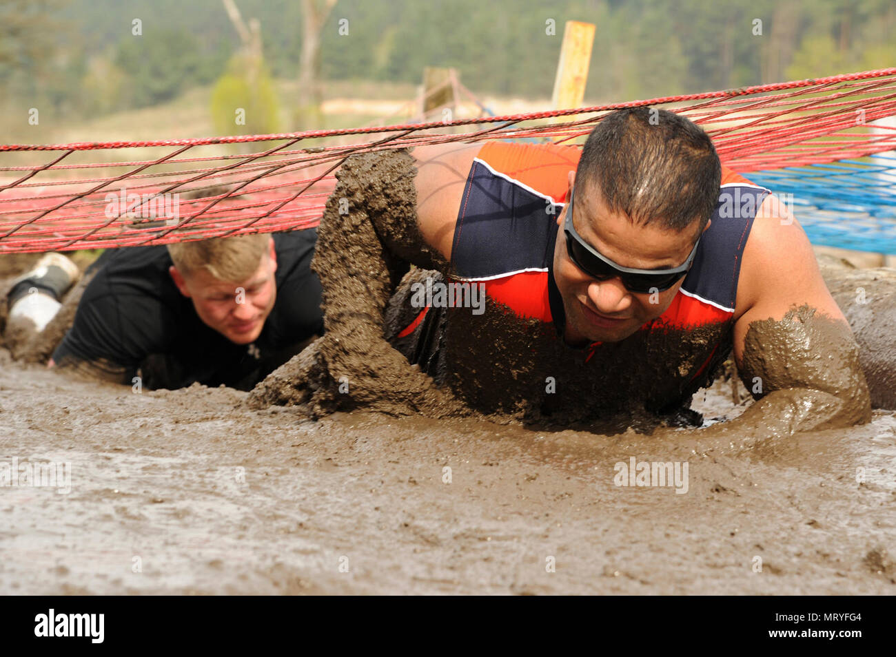 Runners participate in the annual Rugged Terrain Obstacle Run at ...