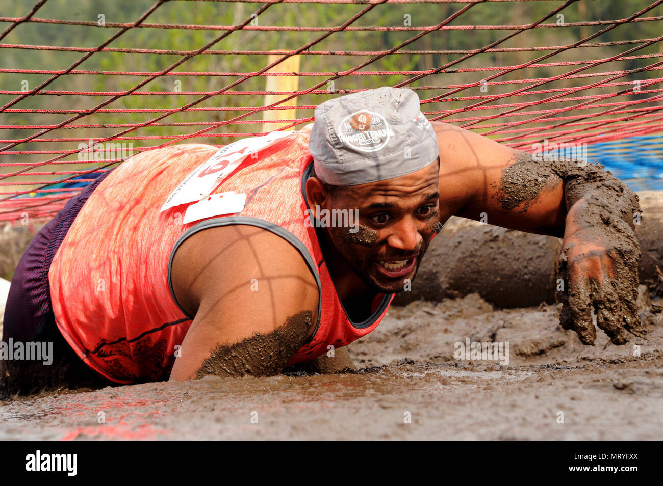 Runners participate in the annual Rugged Terrain Obstacle Run at ...