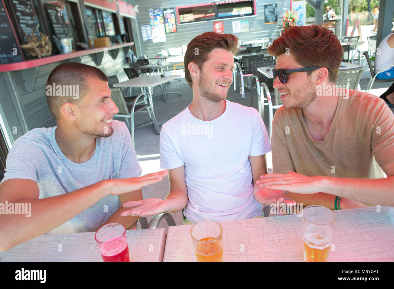 young men and laughter Stock Photo - Alamy