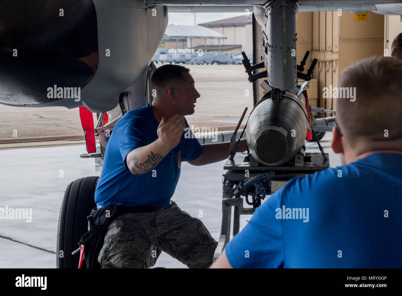Staff Sgt. Johnathan Grieg, 74th Aircraft Maintenance Unit weapons load ...