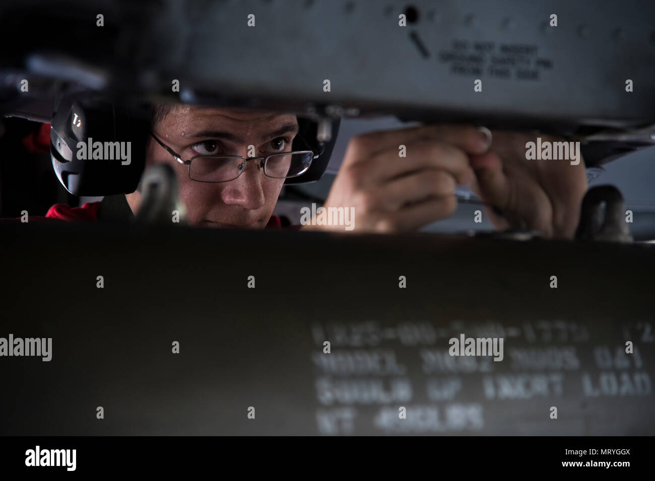 Staff Sgt. Christopher Carlson, 75th Aircraft Maintenance Unit weapons ...