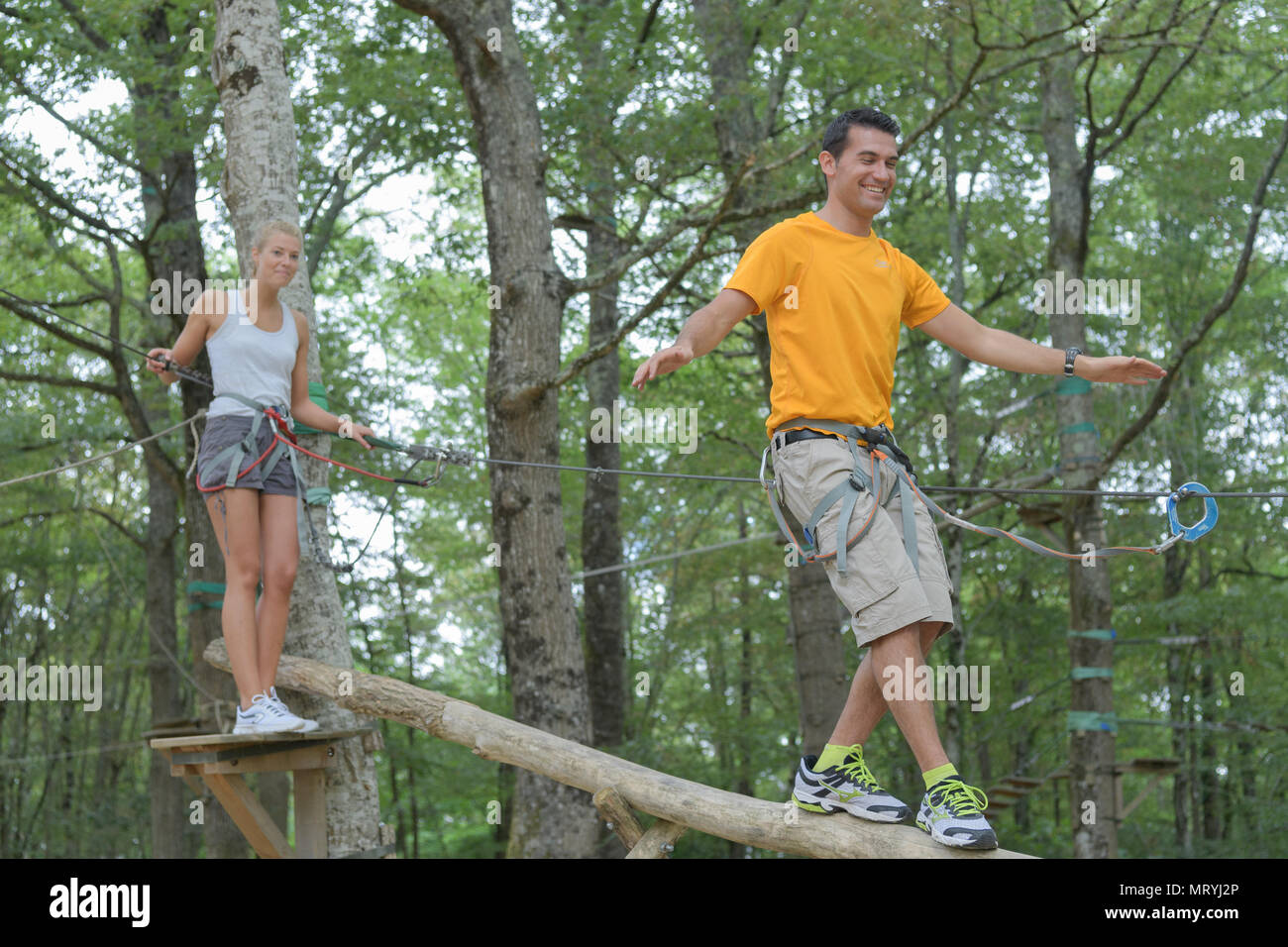 balancing while crossing a log Stock Photo - Alamy