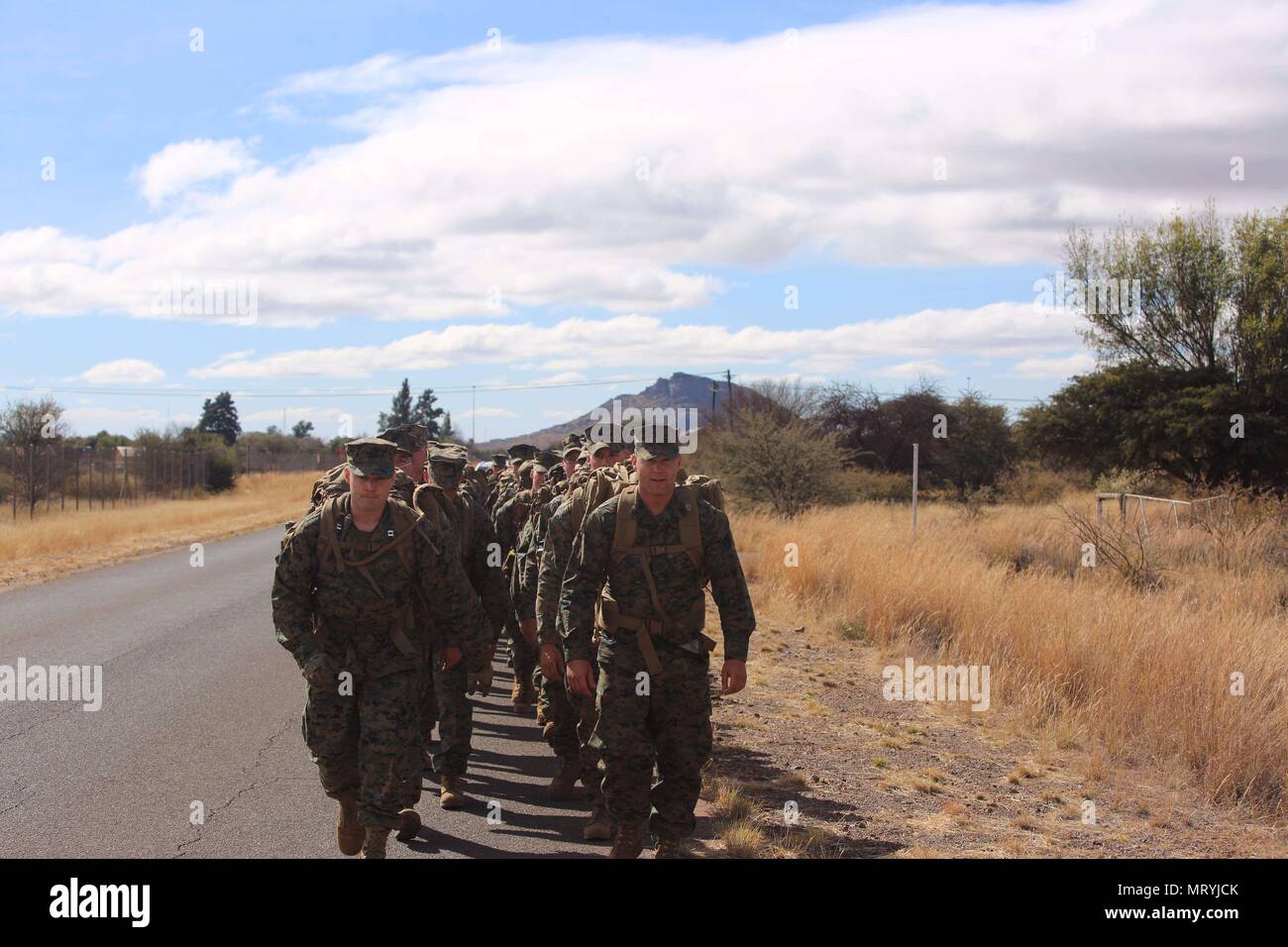 Capt. Joshua A. Bales, assigned to 3rd Battalion, 25th Marines, leads ...