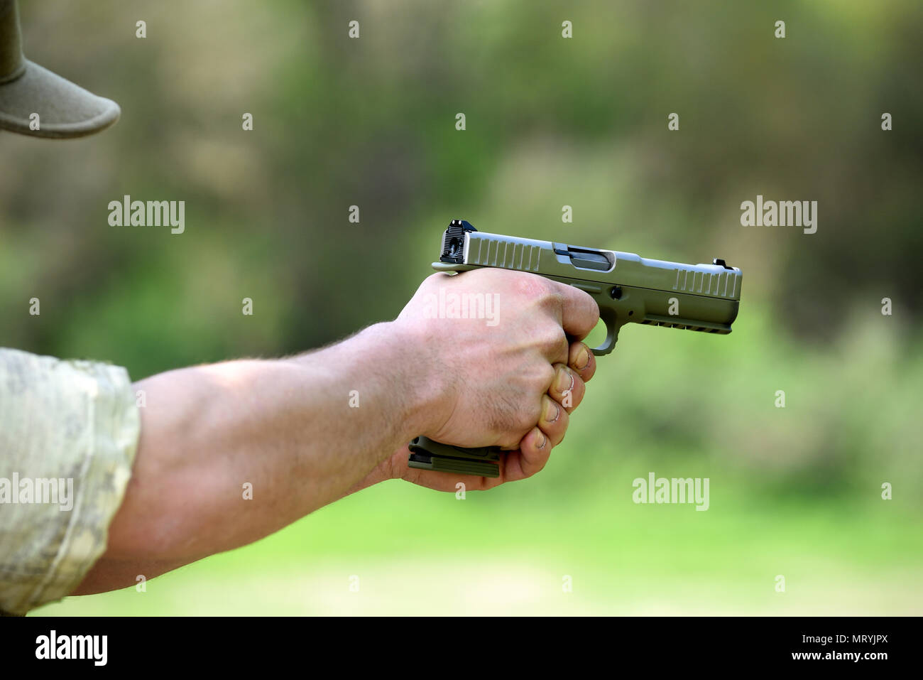 Hands up defence hi-res stock photography and images - Alamy