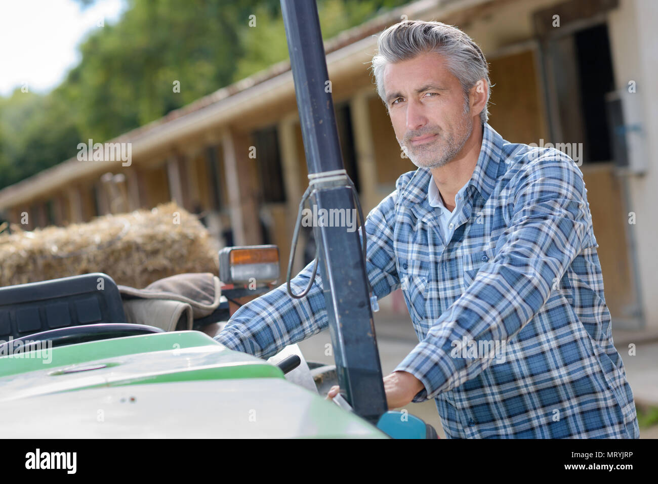 farmer posing outdoors Stock Photo - Alamy
