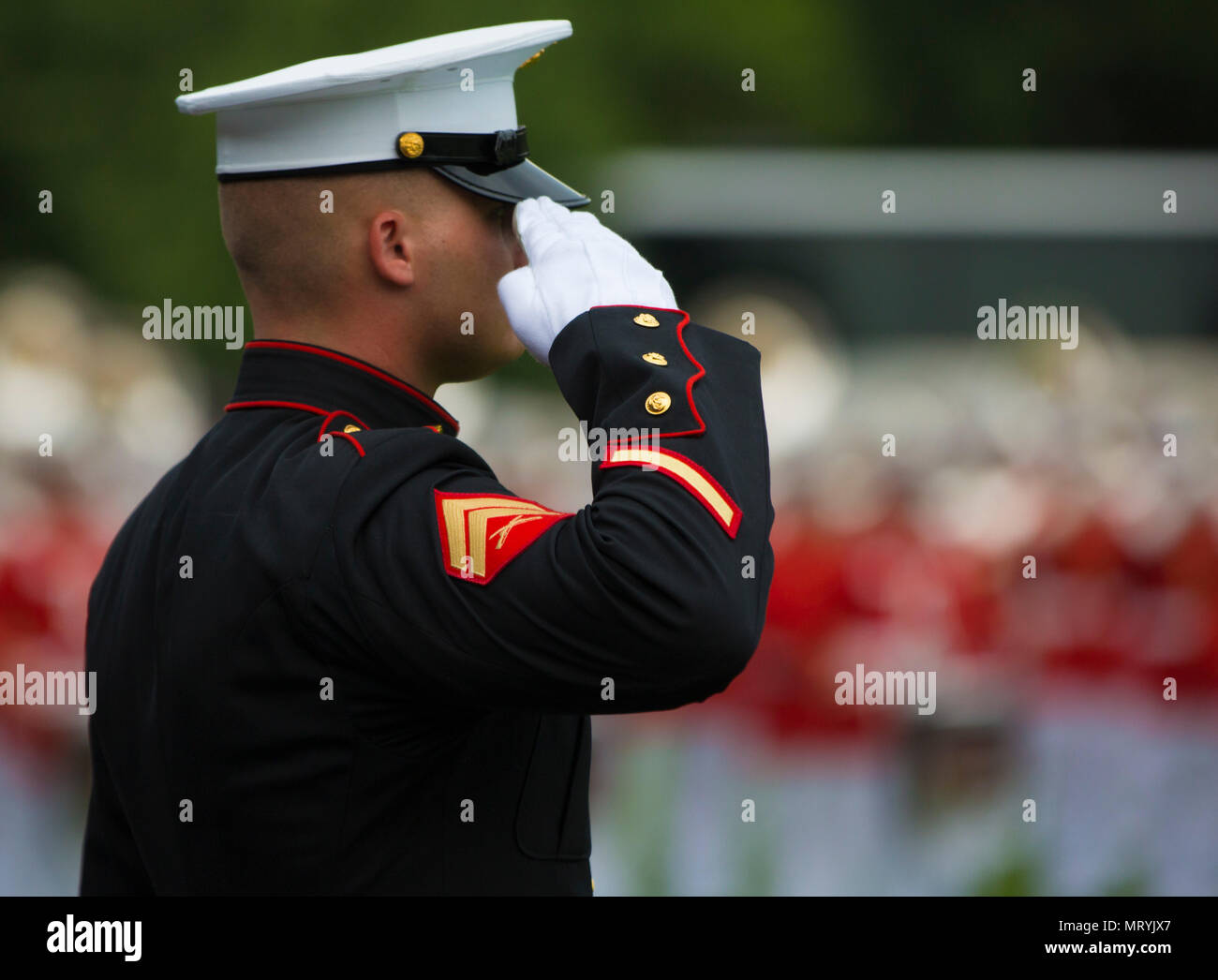 U.S. Marines with Marine Barracks Washington perform during a sunset ...