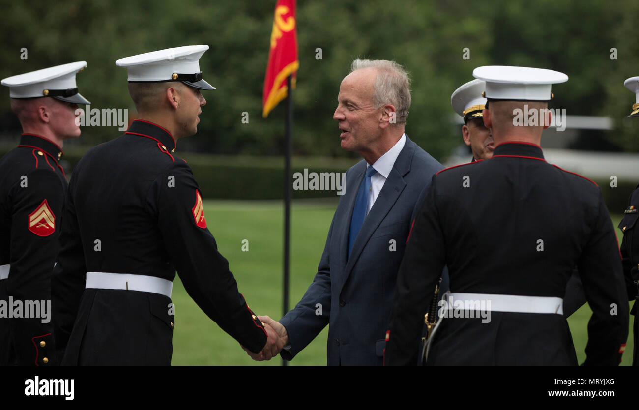 Sen. Gerald W. Moran (KS) shakes hands with U.S. Marines during a ...