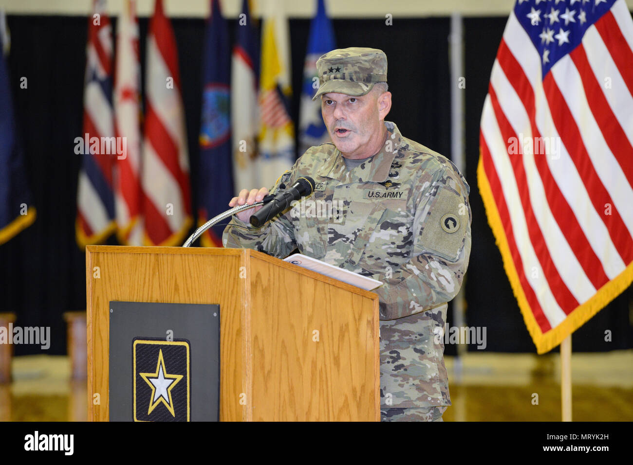 MG Flem B. Walker Jr. addresses soldiers and family members during the ...