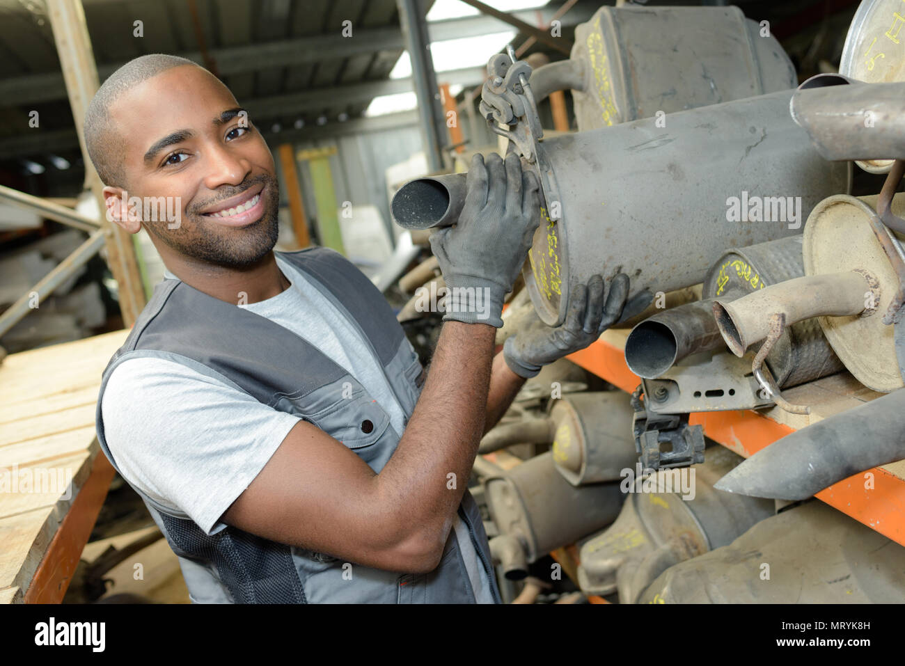 car mechanic and car engine outside the vehicle Stock Photo - Alamy