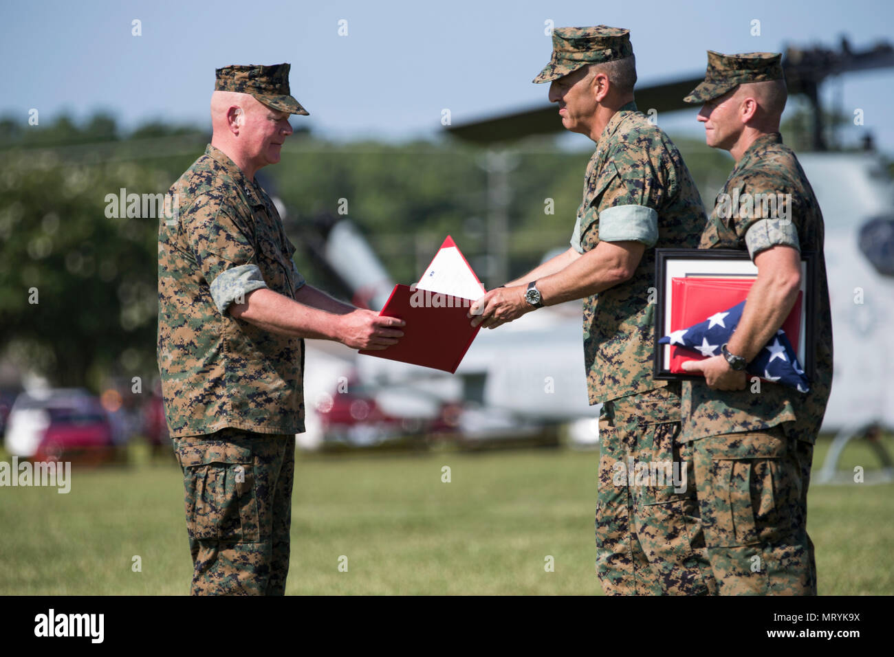 U.S. Marine Corps Maj. Gen. Walter L. Miller Jr., left, former ...