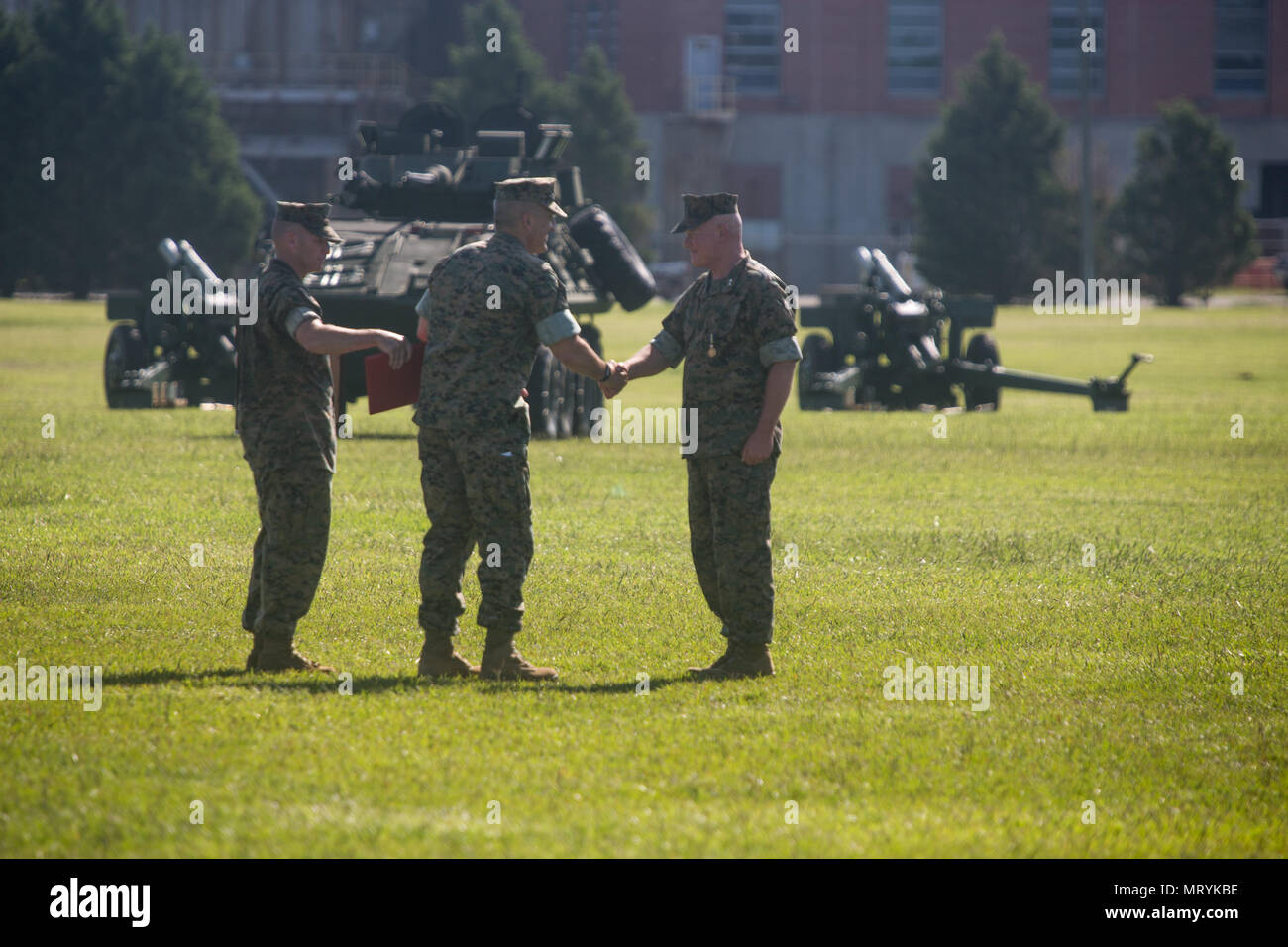 U.S. Marine Corps Lt. Gen. Michael G. Dana, left, shakes hands with Maj ...