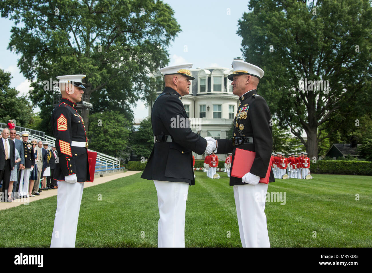 U.S. Marine Corps Gen. Robert B. Neller, middle, commandant of the ...