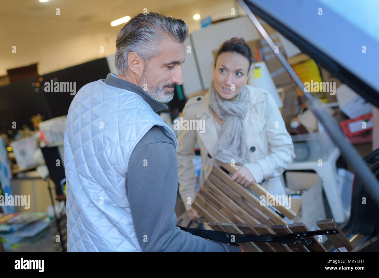 Sales assistant helping customer hi-res stock photography and images ...