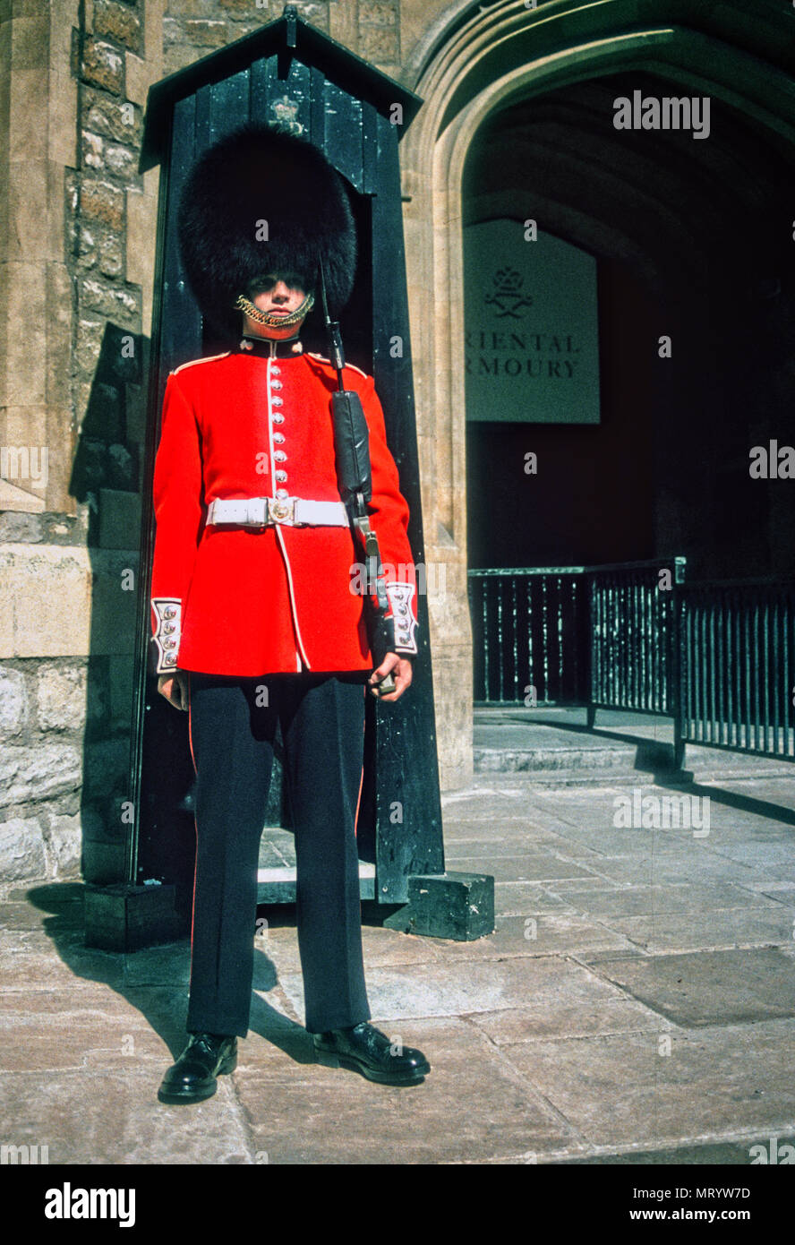 The Queen's guard on sentry at the Tower of London, England Stock Photo ...