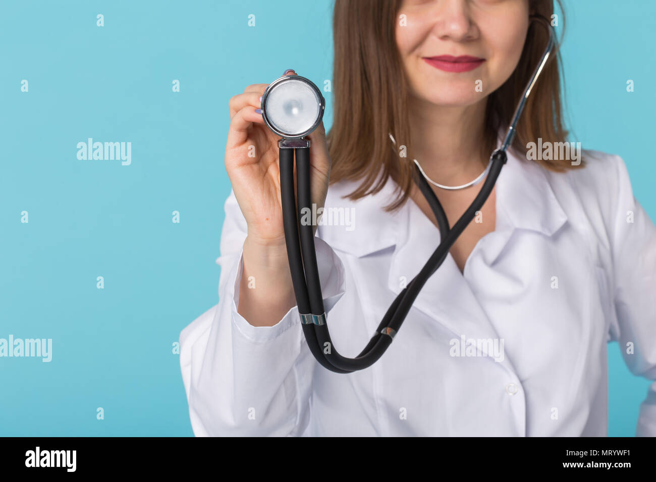 Female doctor with stethoscope, close up Stock Photo - Alamy